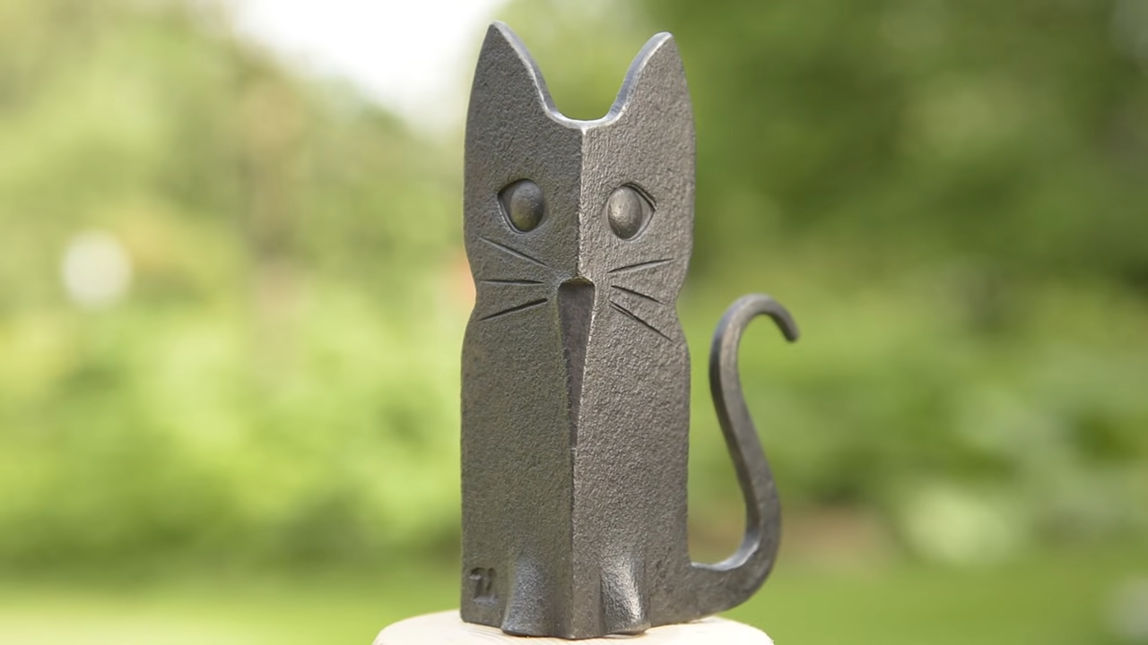 This handmade cat figurine forged by fire would sell for hundreds in stores