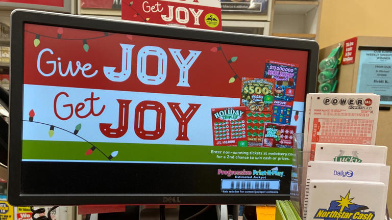 After taxes, how much does the $1.10B Powerball pay?