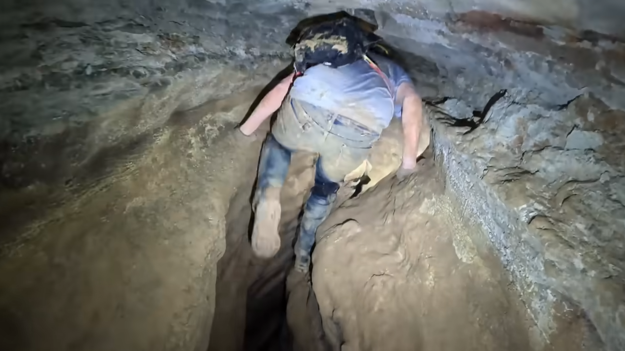 She found a man living in the huge cave on her land