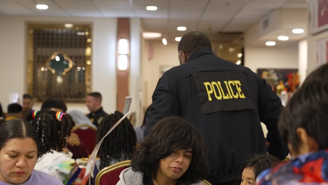 Oakland police host holiday celebration for 100 kids to connect in ...