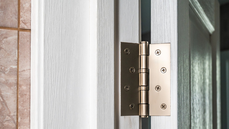 Fix tight & squeaky door hinges using an affordable bathroom essential