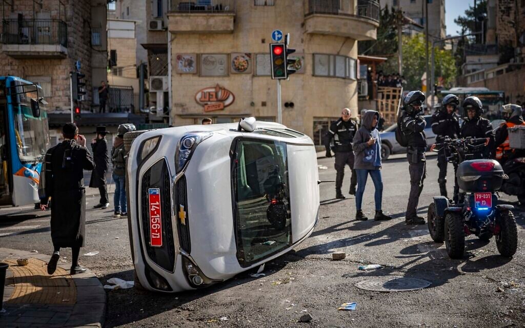 13 cops hurt as ultra-Orthodox riot in Jerusalem; police use tear gas ...