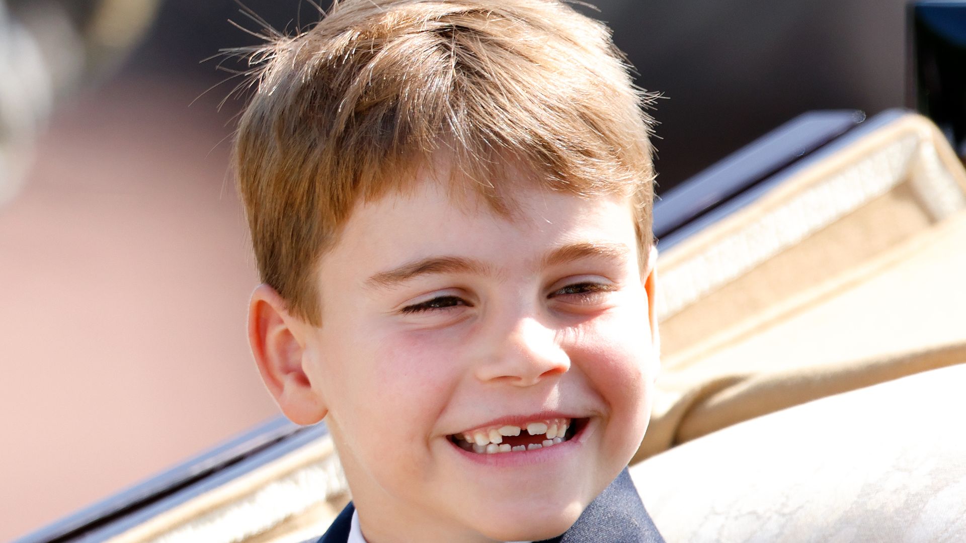 Prince Louis's gap-toothed grin wins over royal fans in unseen portrait