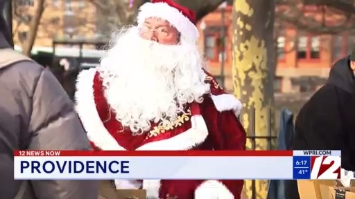 Santa gives out donations to those in need in Providence