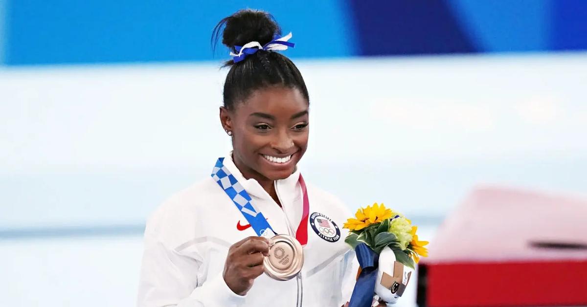 Simone Biles slammed by PETA for purchasing dog who underwent ...