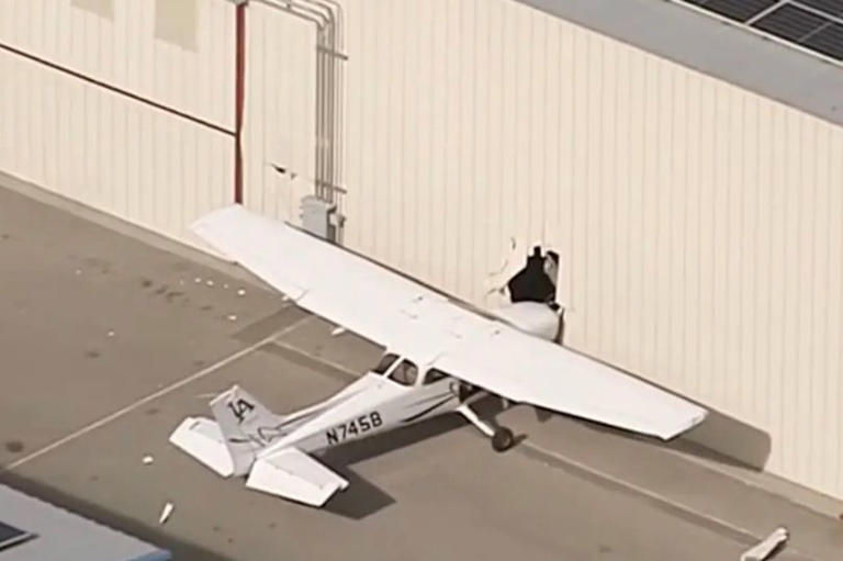 Stolen plane crashes into Van Nuys Airport building as FBI swarm scene