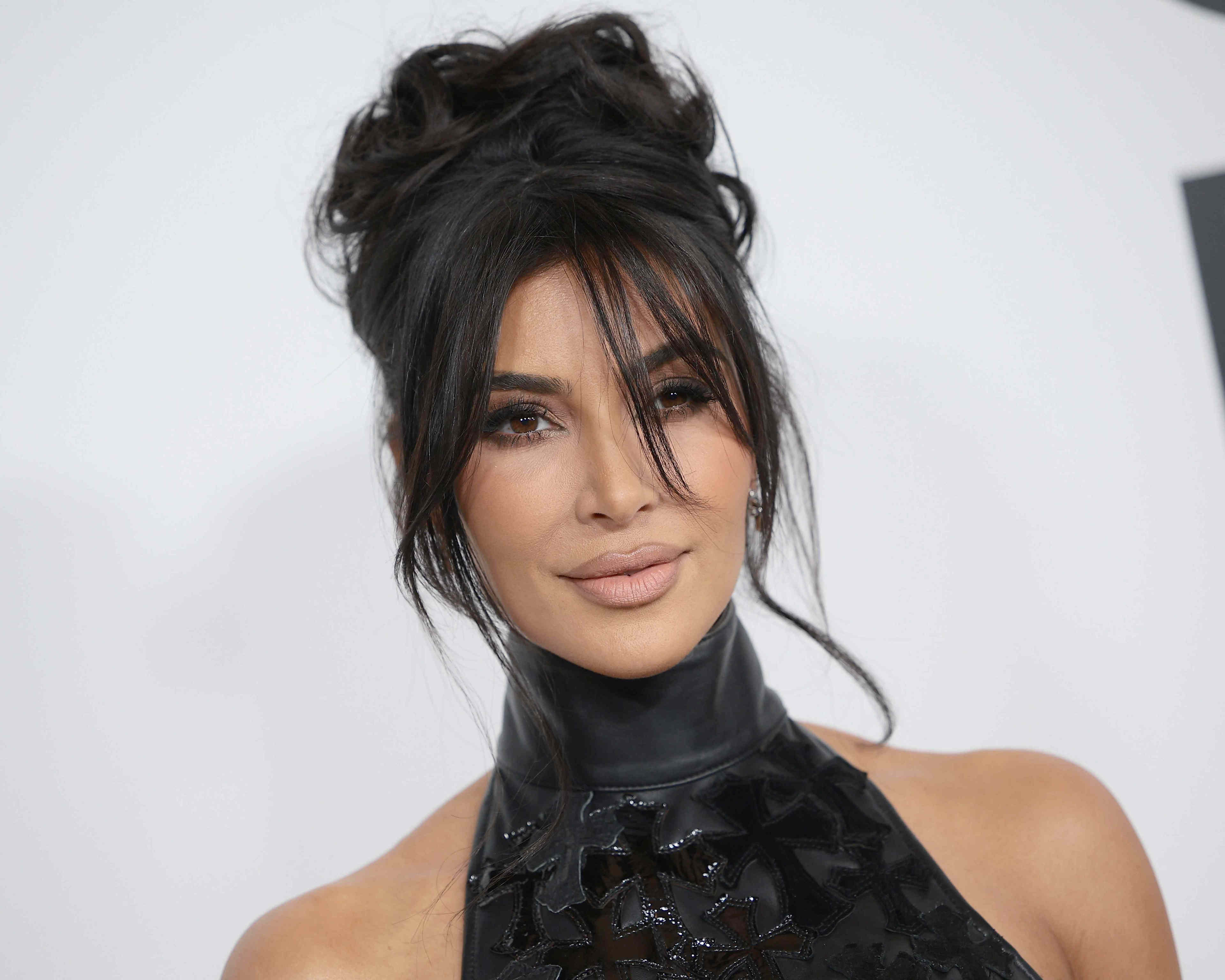 Kim Kardashian poses for portraits with her 4 kids in her most ...