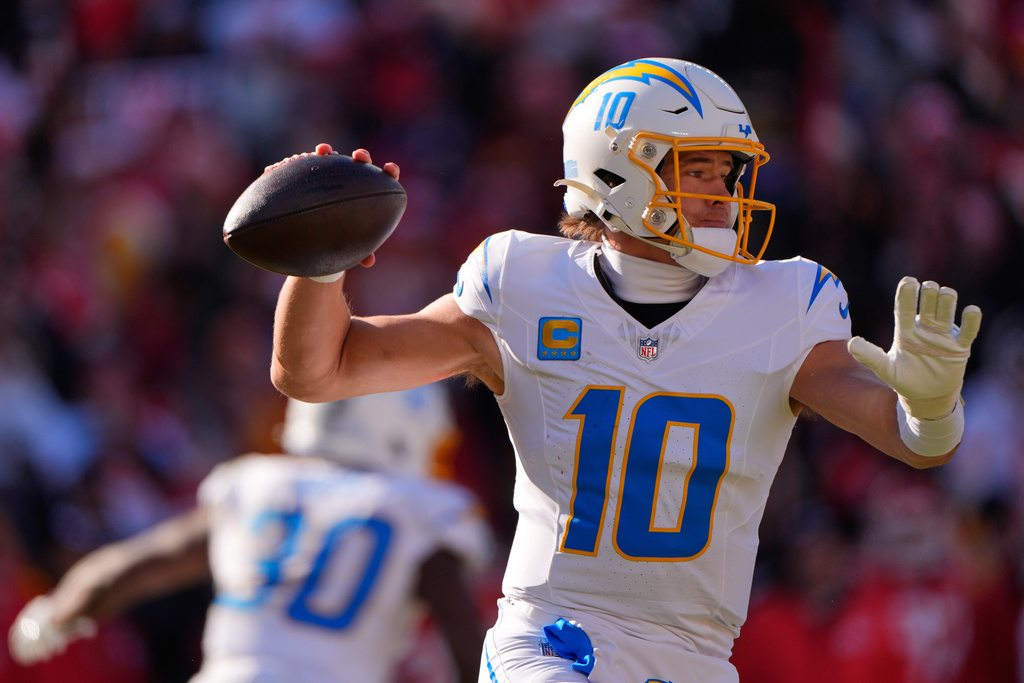 Injured Justin Herbert leads the Chargers' playoff push, and they can ...