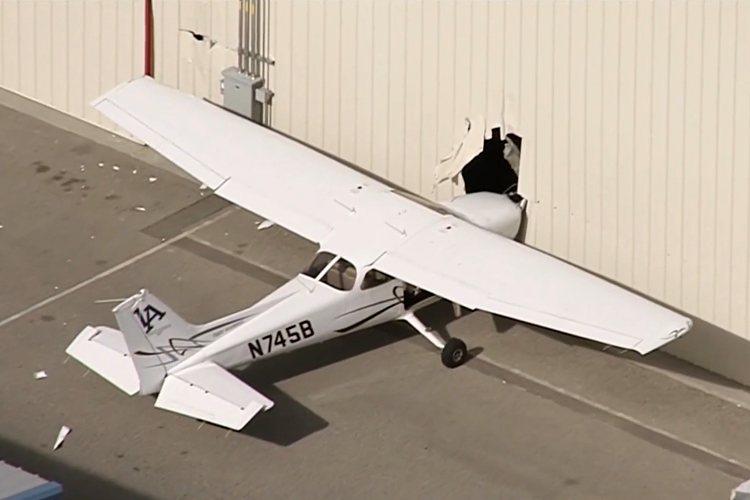 Hijacked plane crashes into Van Nuys airport building