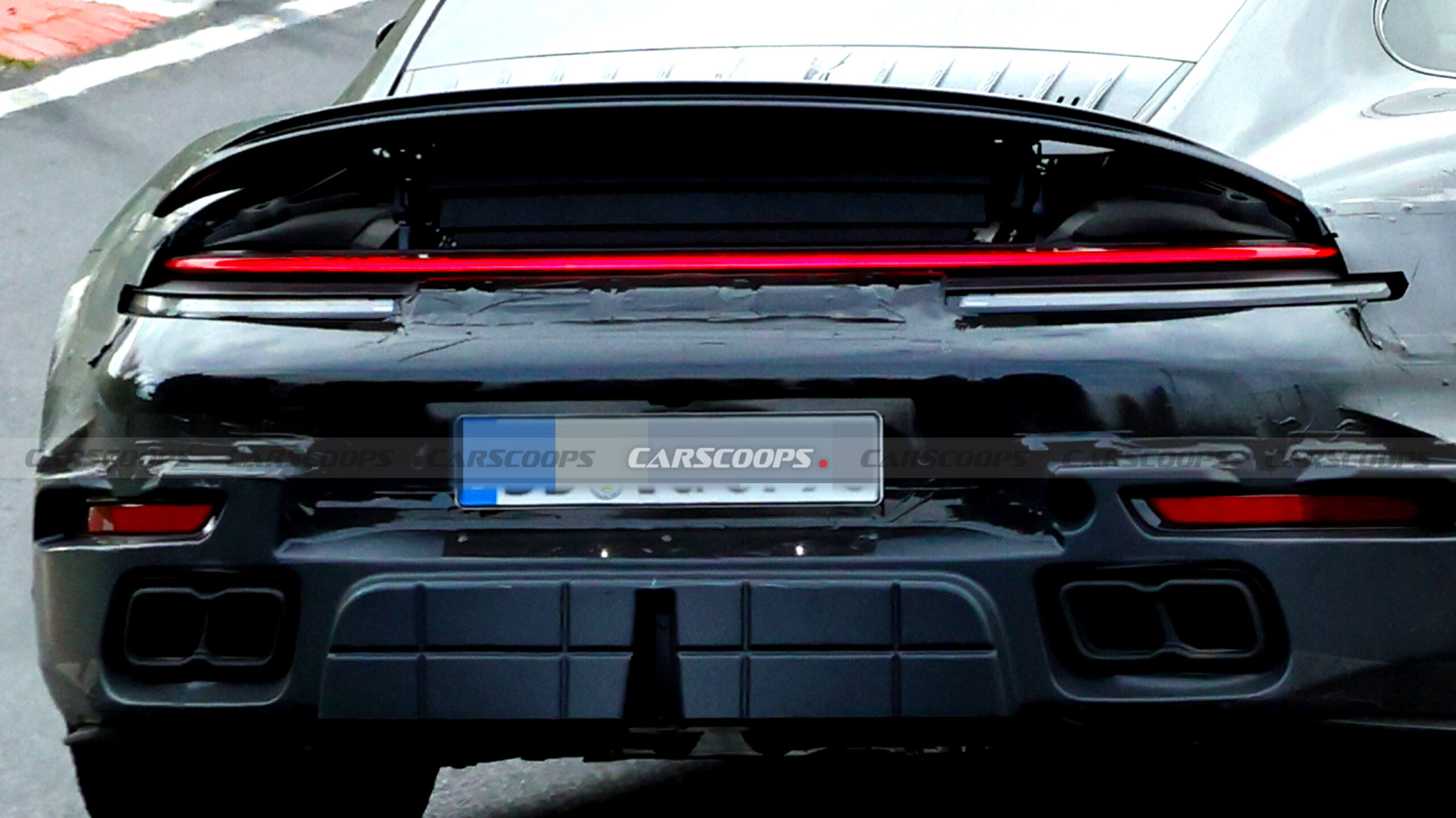 Less wing, fewer intakes, more Porsche? This 911 prototype thinks so