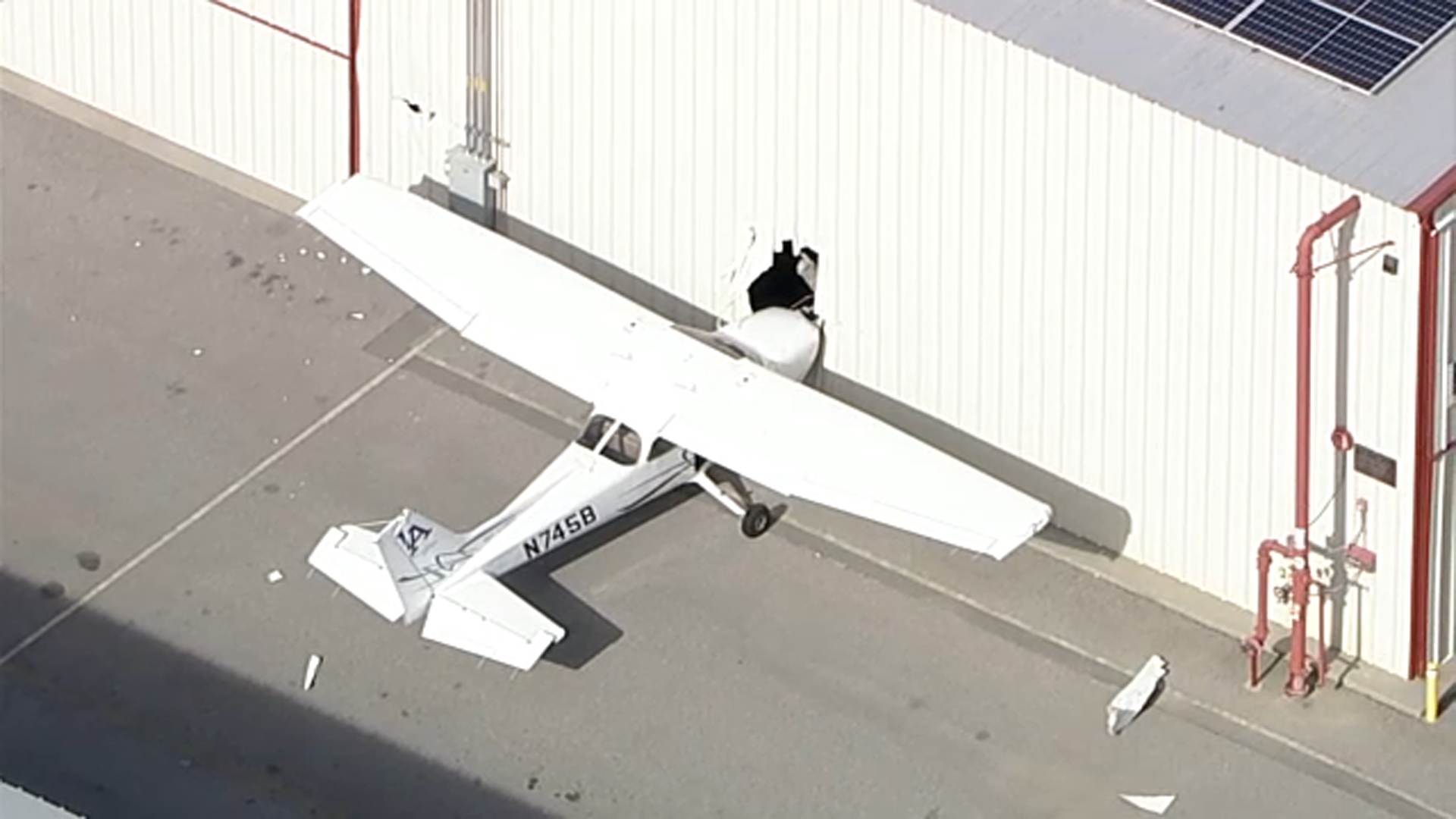 Man arrested after allegedly stealing small plane, crashing into hangar ...