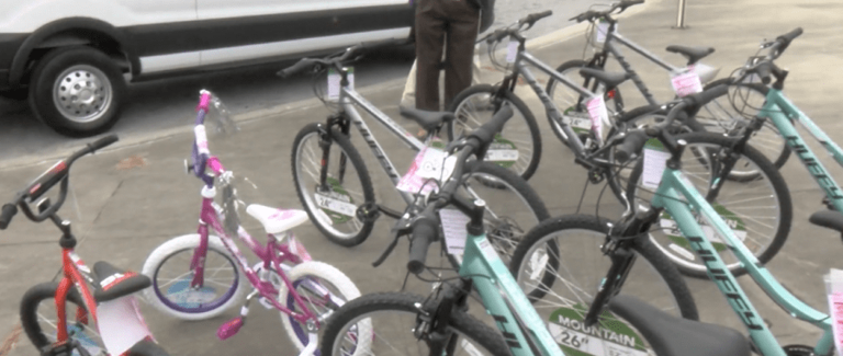 Kinston native hosts 3rd annual Race to Success bike giveaway