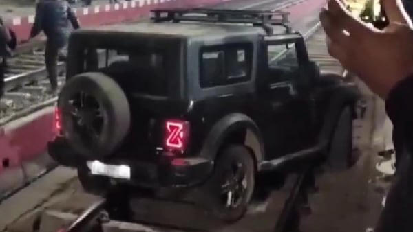Viral: Mahindra Thar owner drives on railway tracks, instantly regrets it