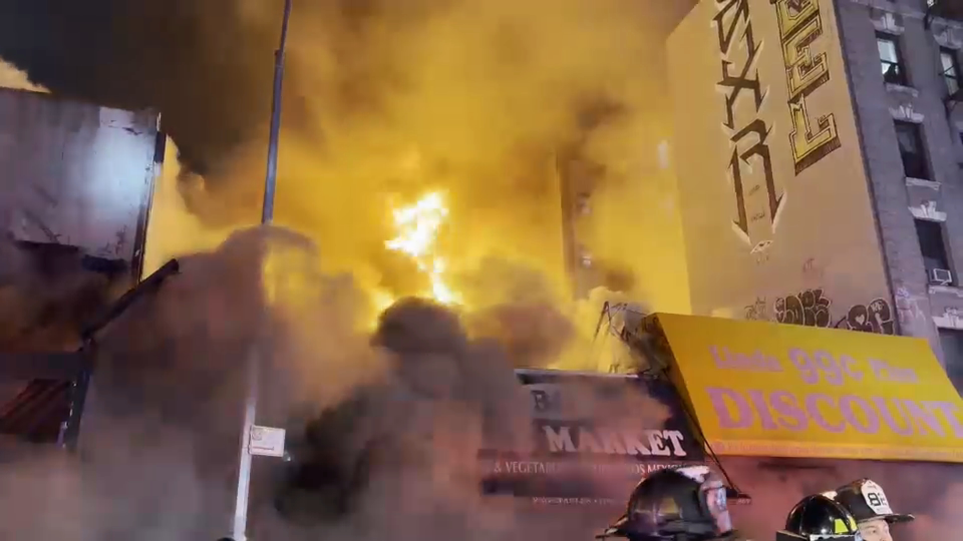 5-alarm fire rips through several businesses and apartment building; 1 ...