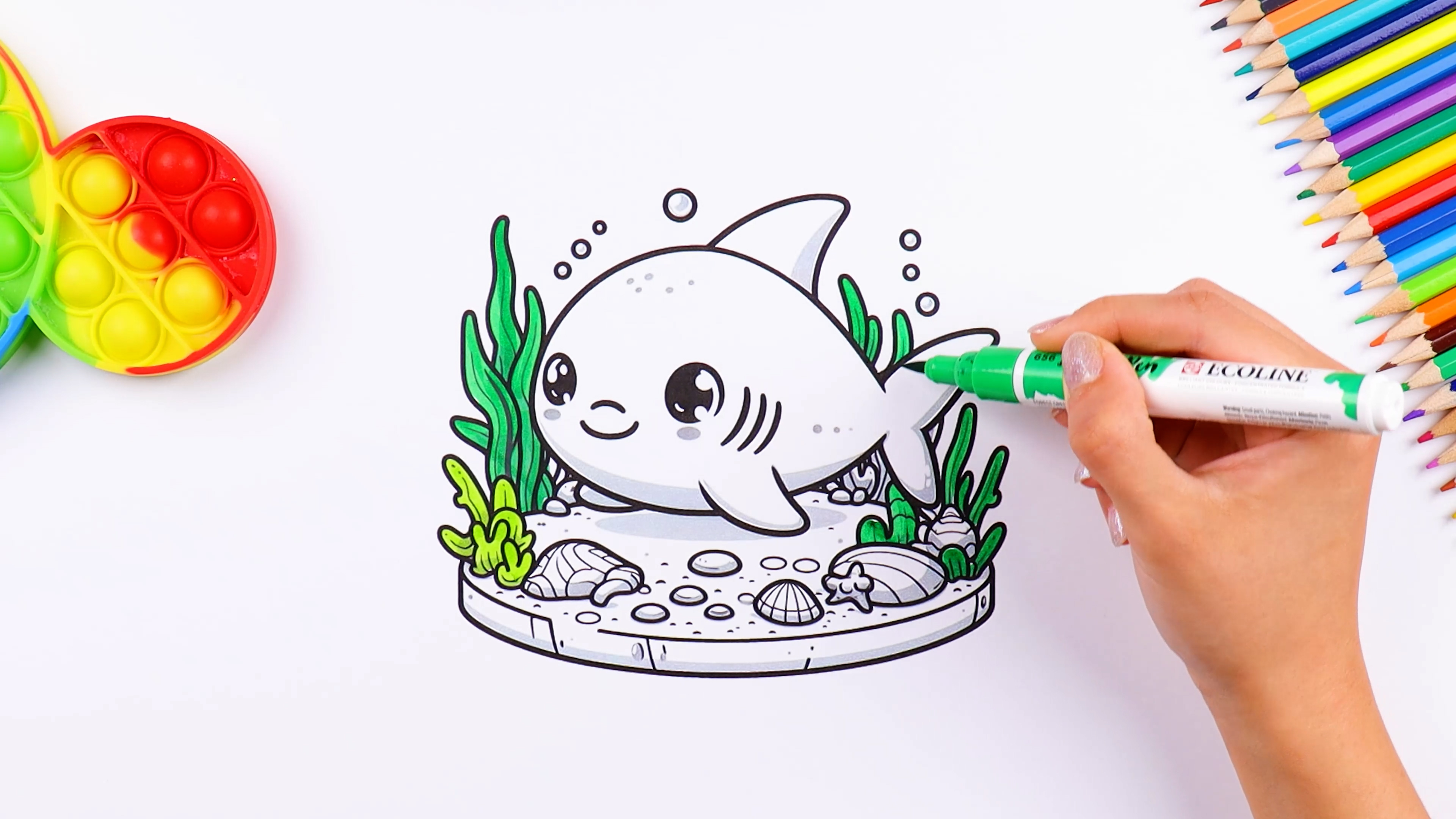 Coloring in a fun drawing and learning colors