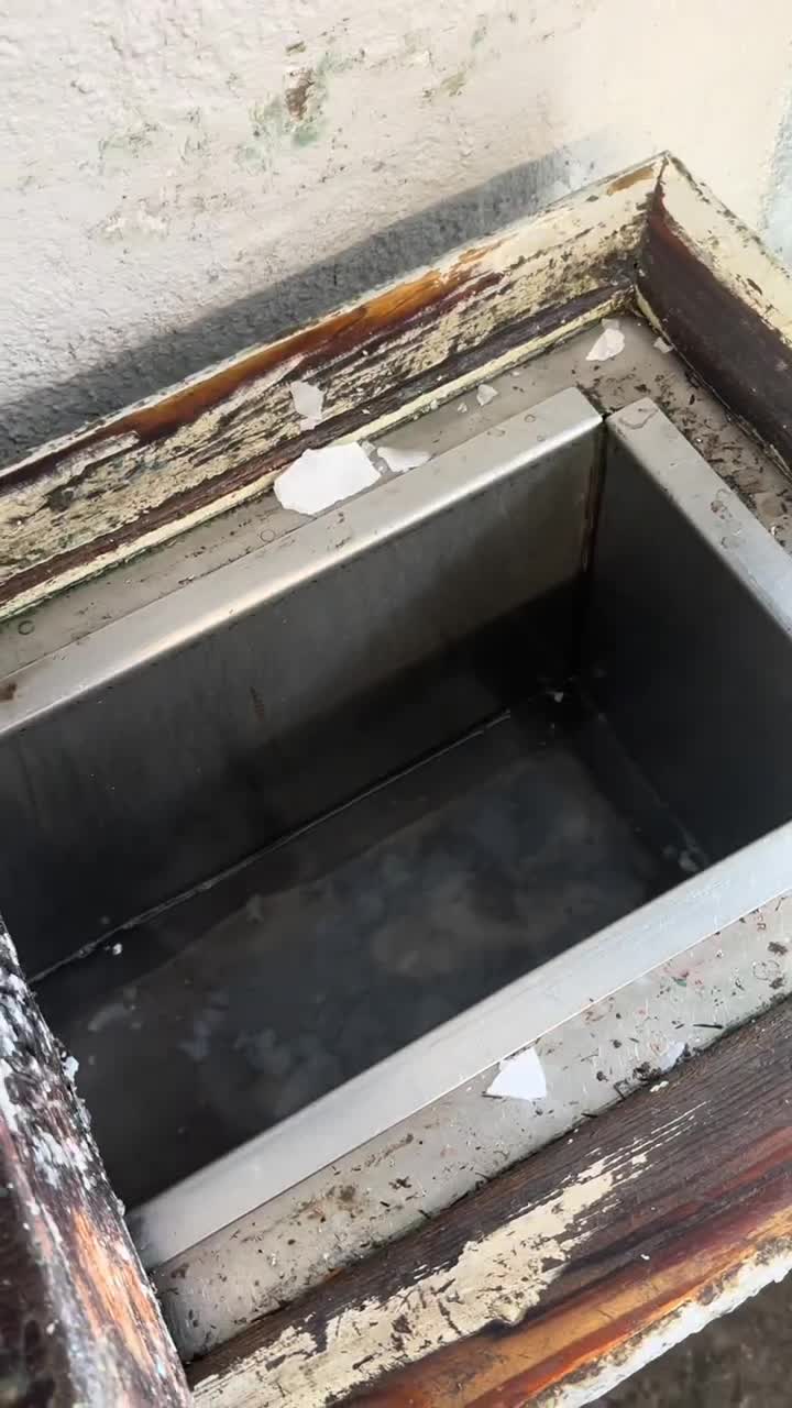 Scraping wax off a messy jug