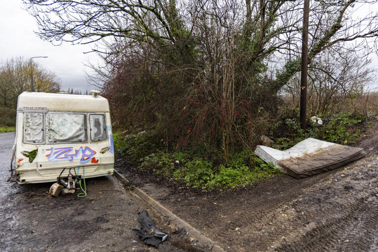 29 pictures of 'eyesore caravan city' littered with mattresses, chairs ...