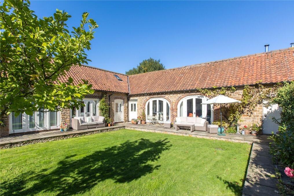 This charming barn conversion arranged around a pretty courtyard in a ...