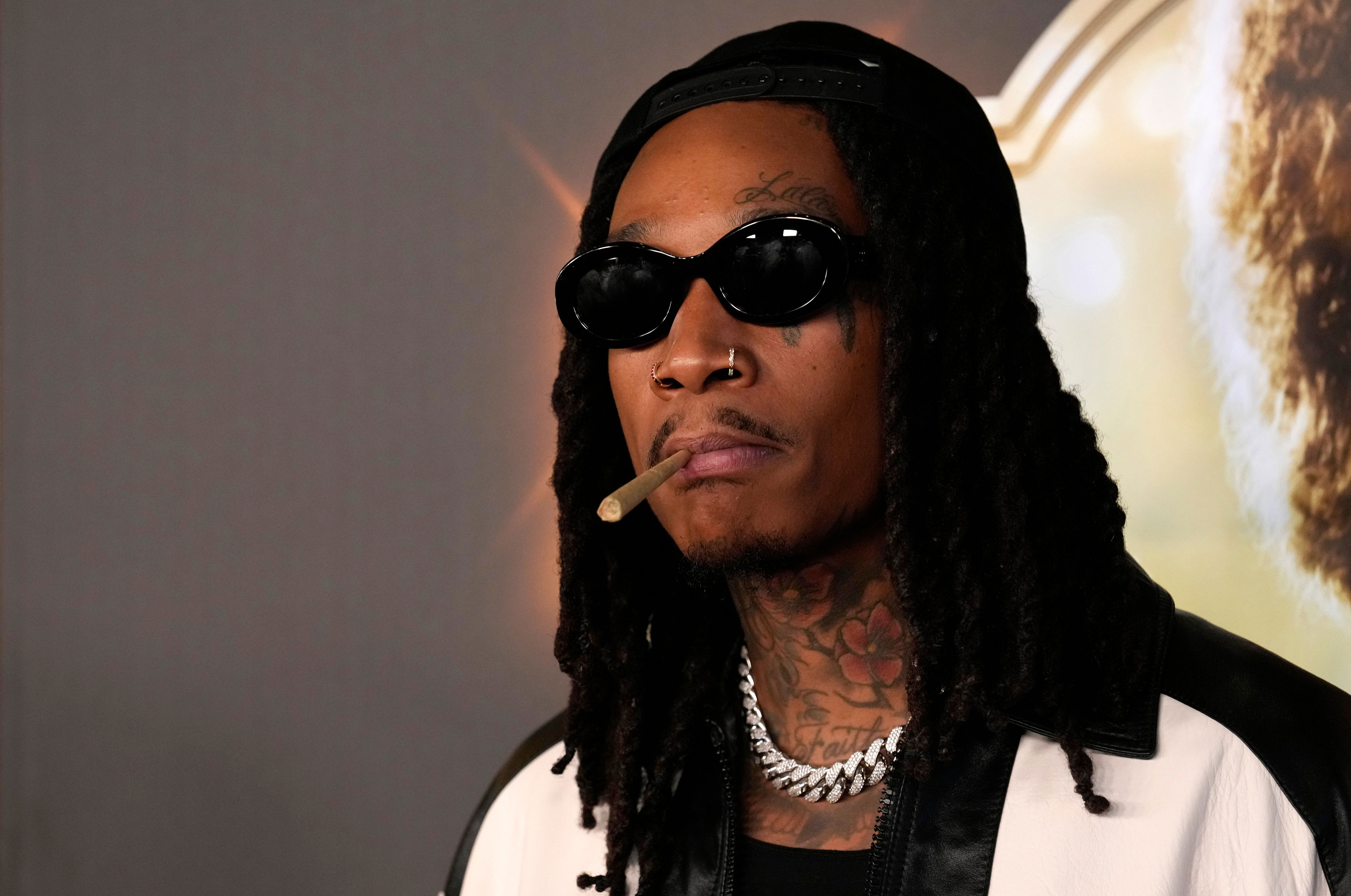 Romanian court sentences rapper Wiz Khalifa to nine months for drug ...