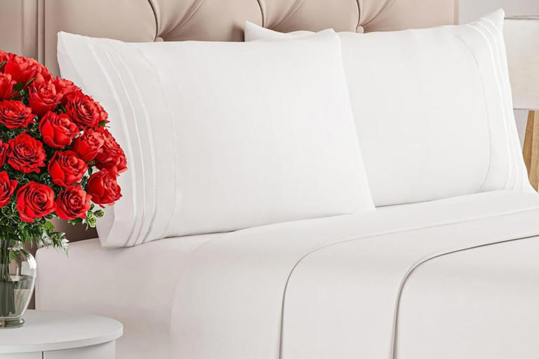 This fluffy mattress pad with 10,000+ perfect ratings feels like ...