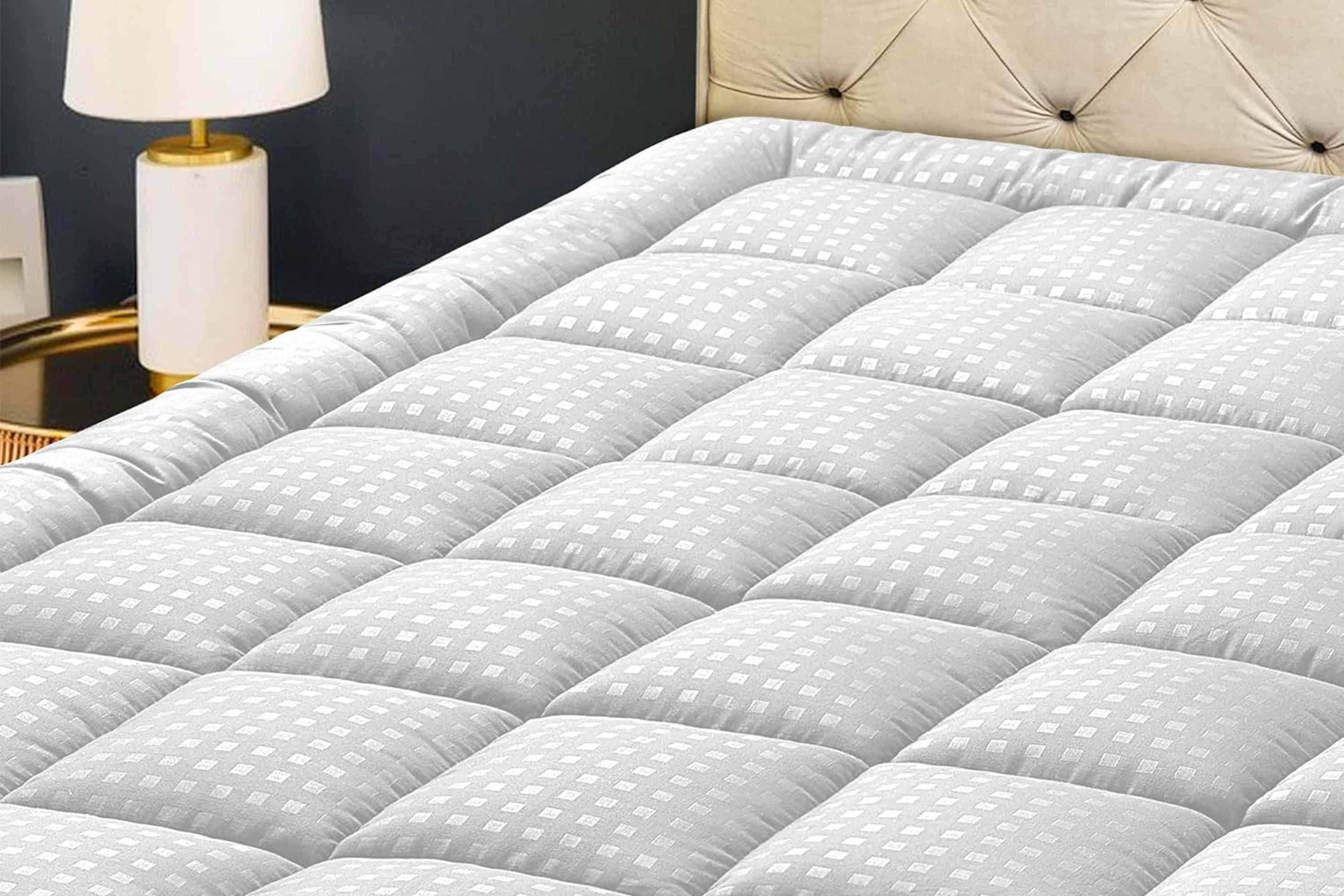 This fluffy mattress pad with 10,000+ perfect ratings feels like ...