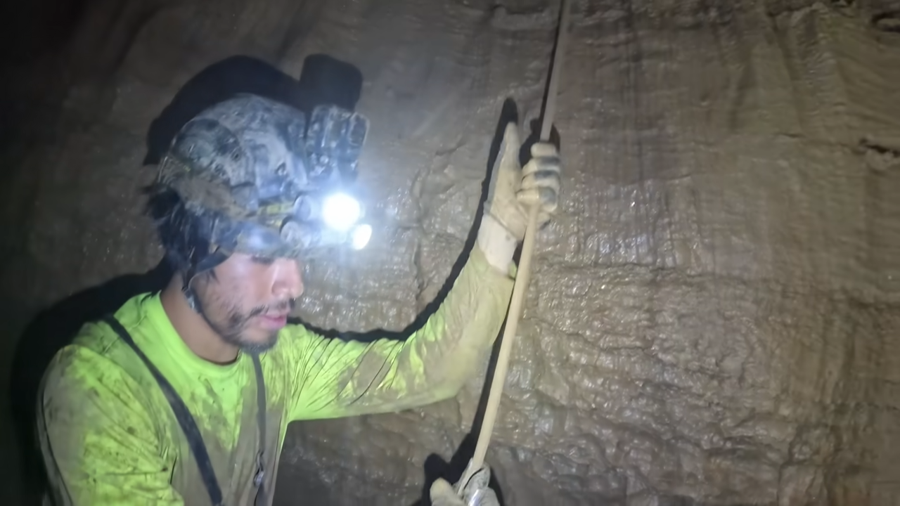 What happens when a cave drops 180 feet straight into hell