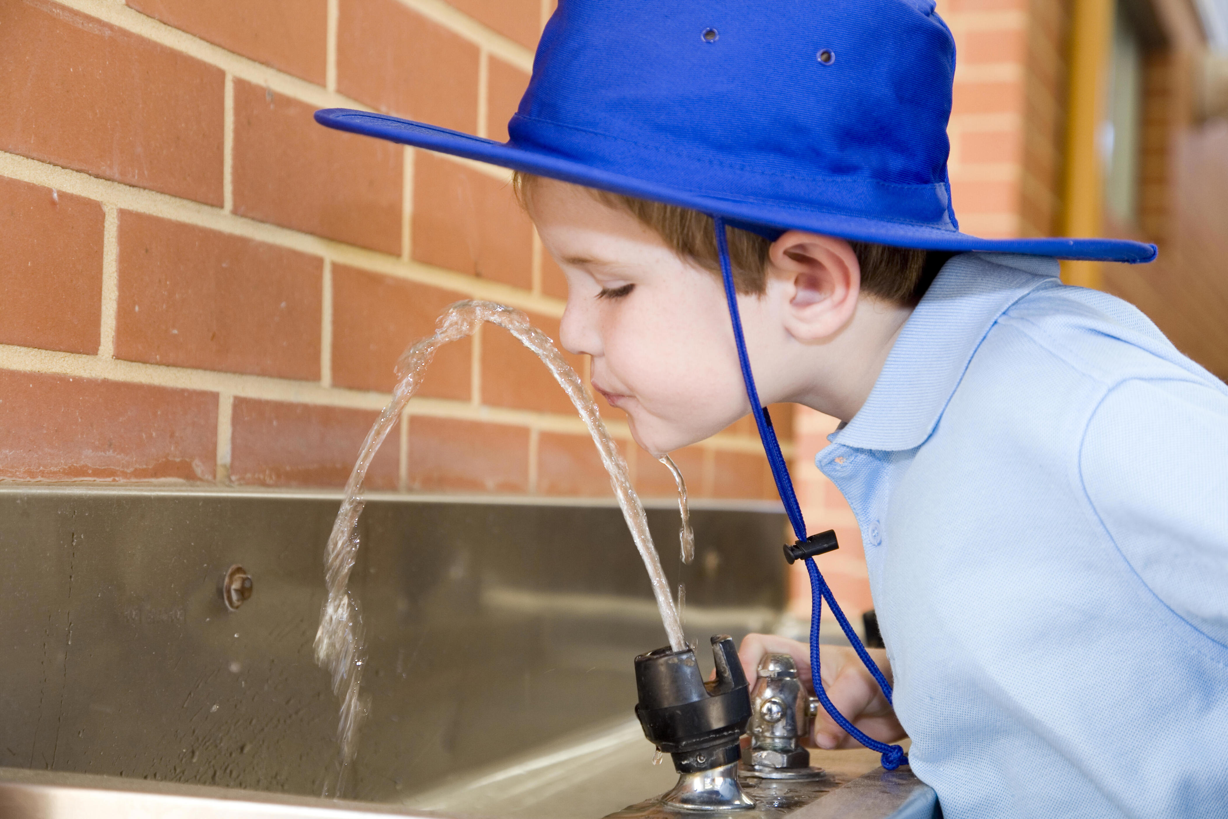 Elementary school's water supply contaminated by leaking garbage dump