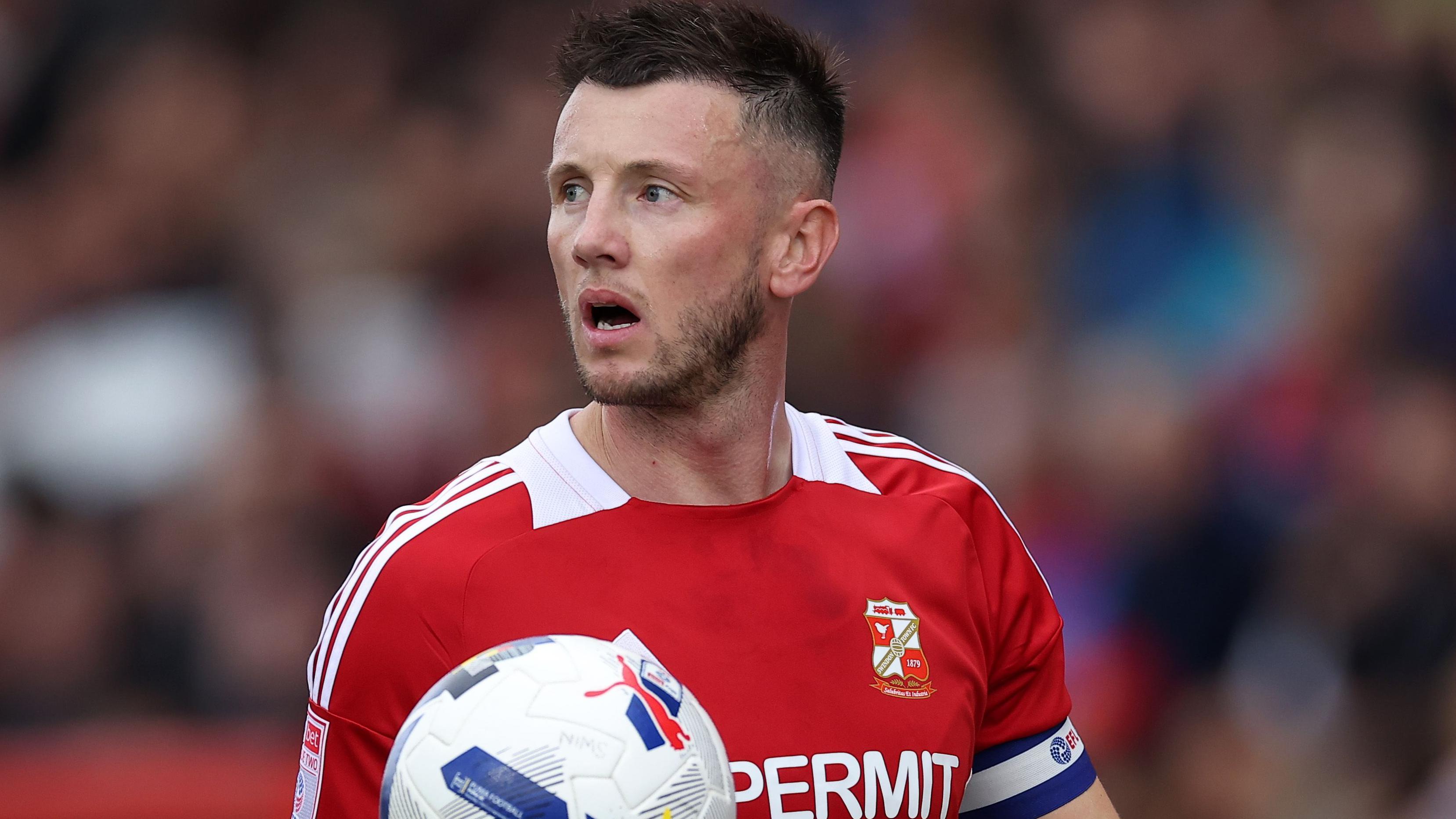 Swindon Town condemn Clarke's seven-game ban