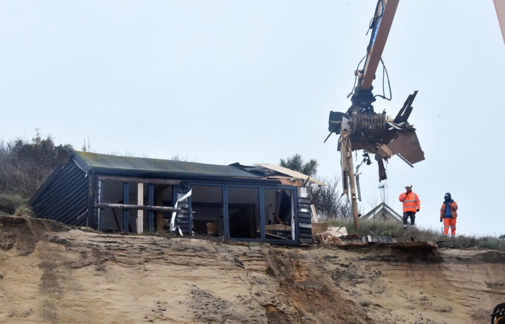 Soldier loses battle to save clifftop home as demolition goes ahead