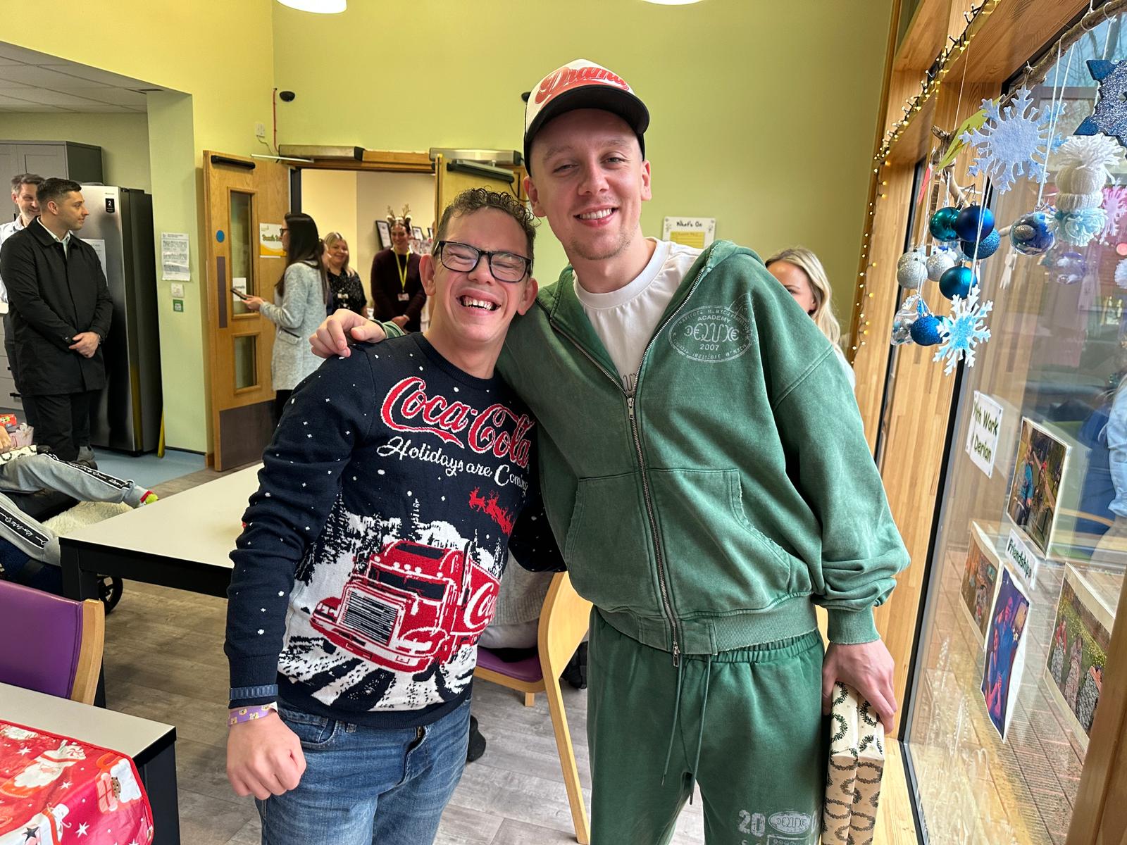 I'm a Celebrity rapper Aitch drops in to Chorley's Derian House ...