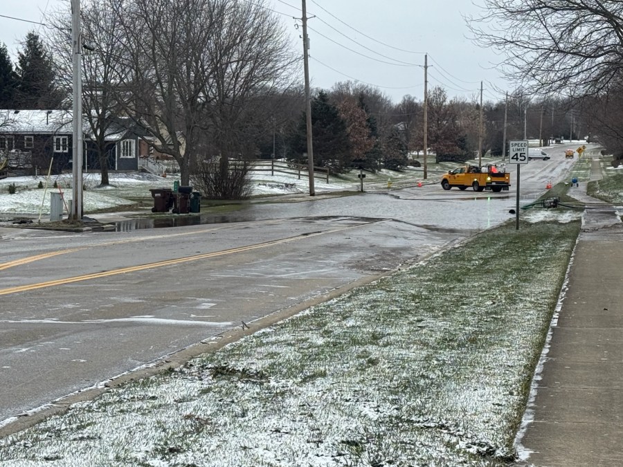 High water near downed power line closes road in Washington Twp.