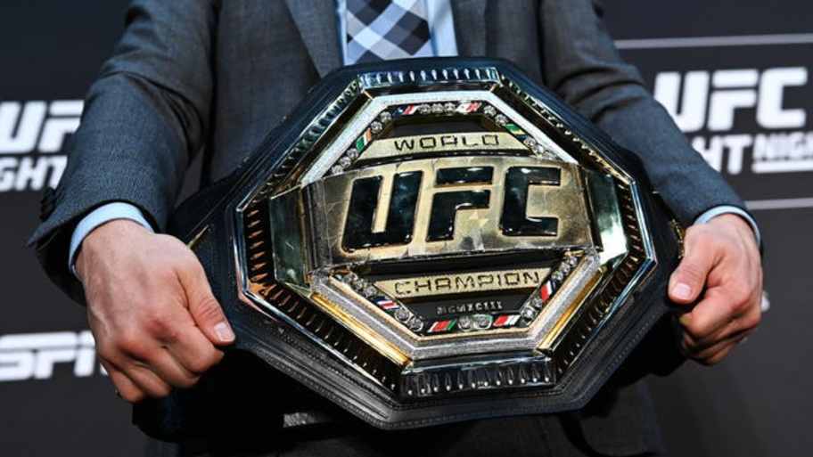 Boxing match between ex-UFC champions ends in nasty finish on Paul vs ...
