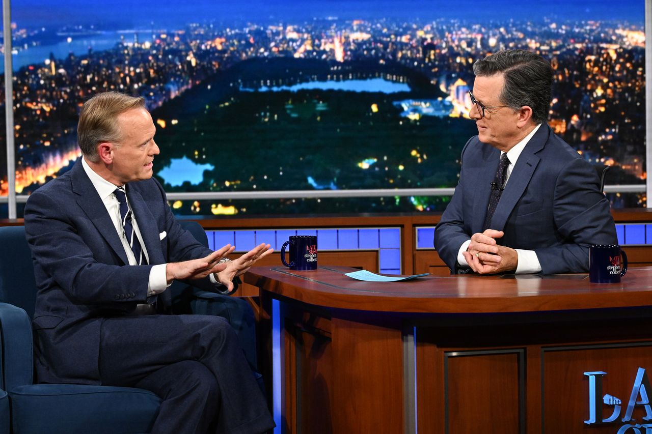 Stephen Colbert gives the middle finger after hugging CBS Evening's ...