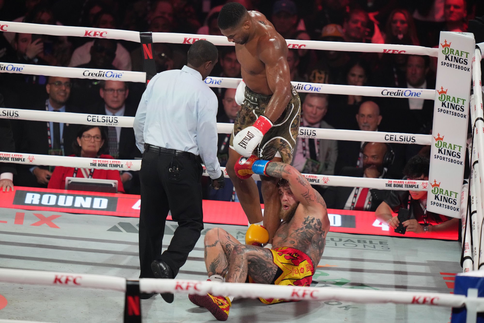 Anthony Joshua knocks out Jake Paul to win controversial Netflix boxing ...