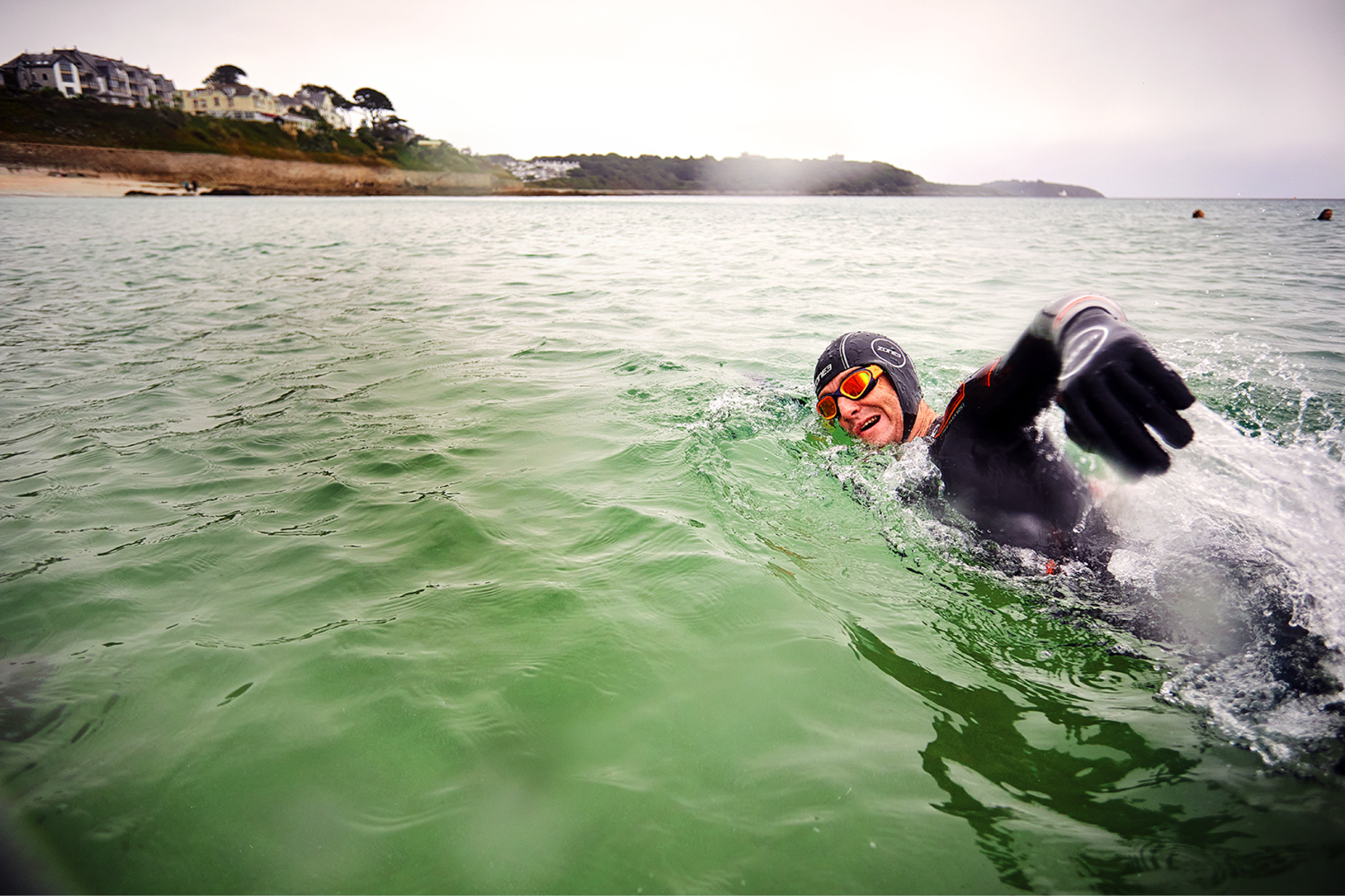 Essential cold water swimming gear to keep you warm and safe year-round