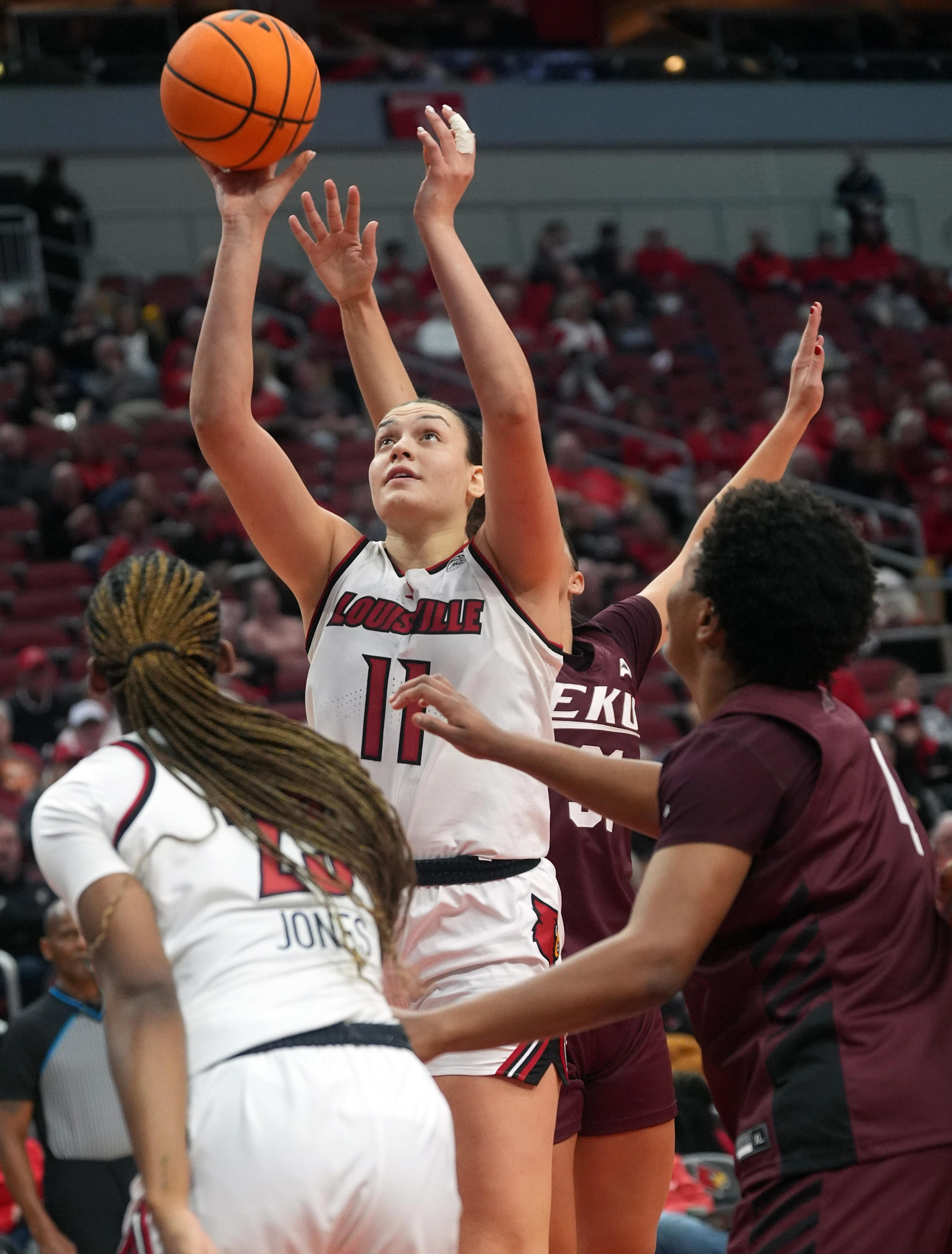 Where is Louisville women's basketball in AP Top 25 and Coaches Poll?