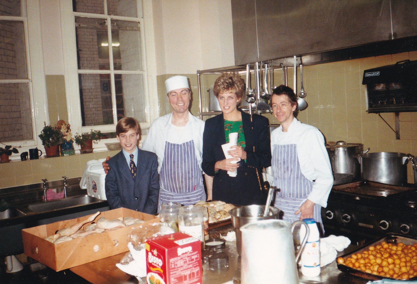 William and George don aprons to help with Christmas lunch at homeless ...