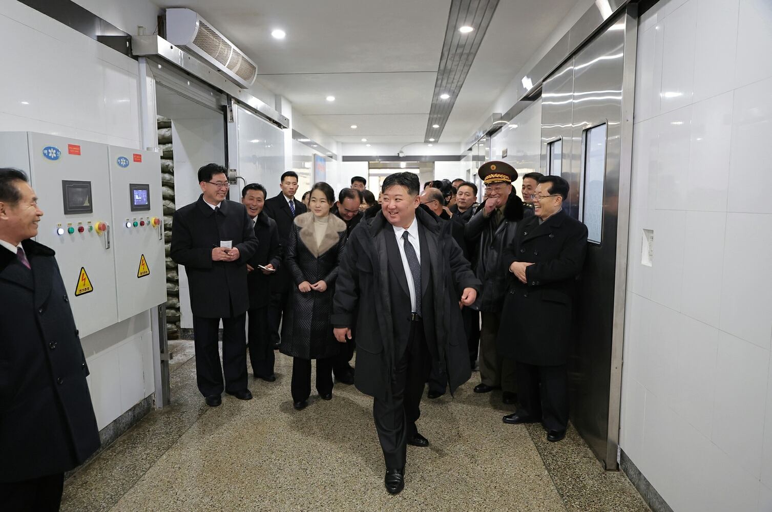 Kim Jong-un inspects factory as daughter Ju-ae follows behind