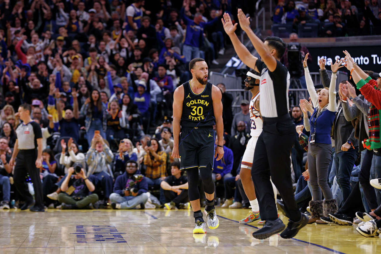 Steph Curry, Jimmy Butler help Warriors close out win over Suns