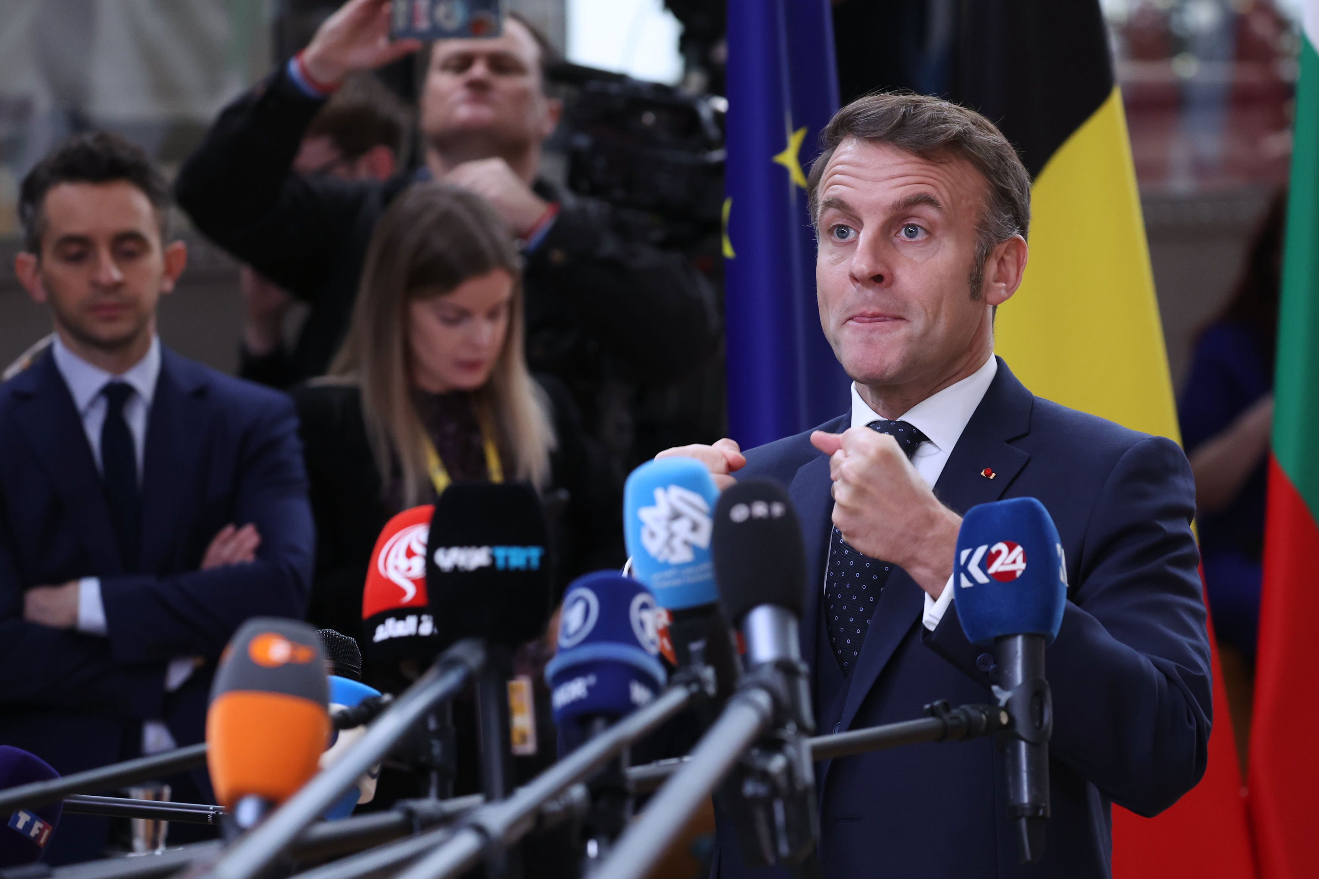 Macron halts remarks amid microphone chaos