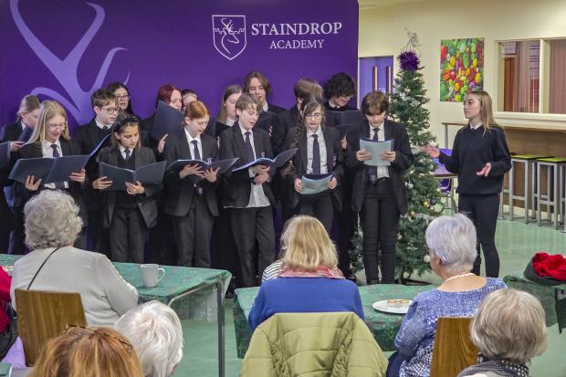 Pupils bring community together at school’s Christmas party