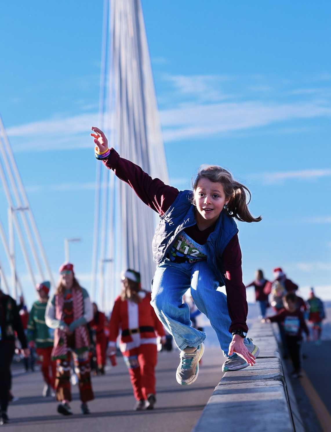 2,300 Santas, flamingos and more join 47th Lampson Cable Bridge Run