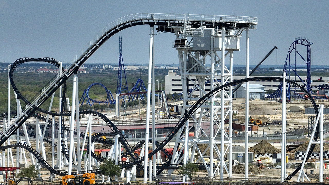 Two riders trapped more than 100 feet in air after Texas roller coaster ...