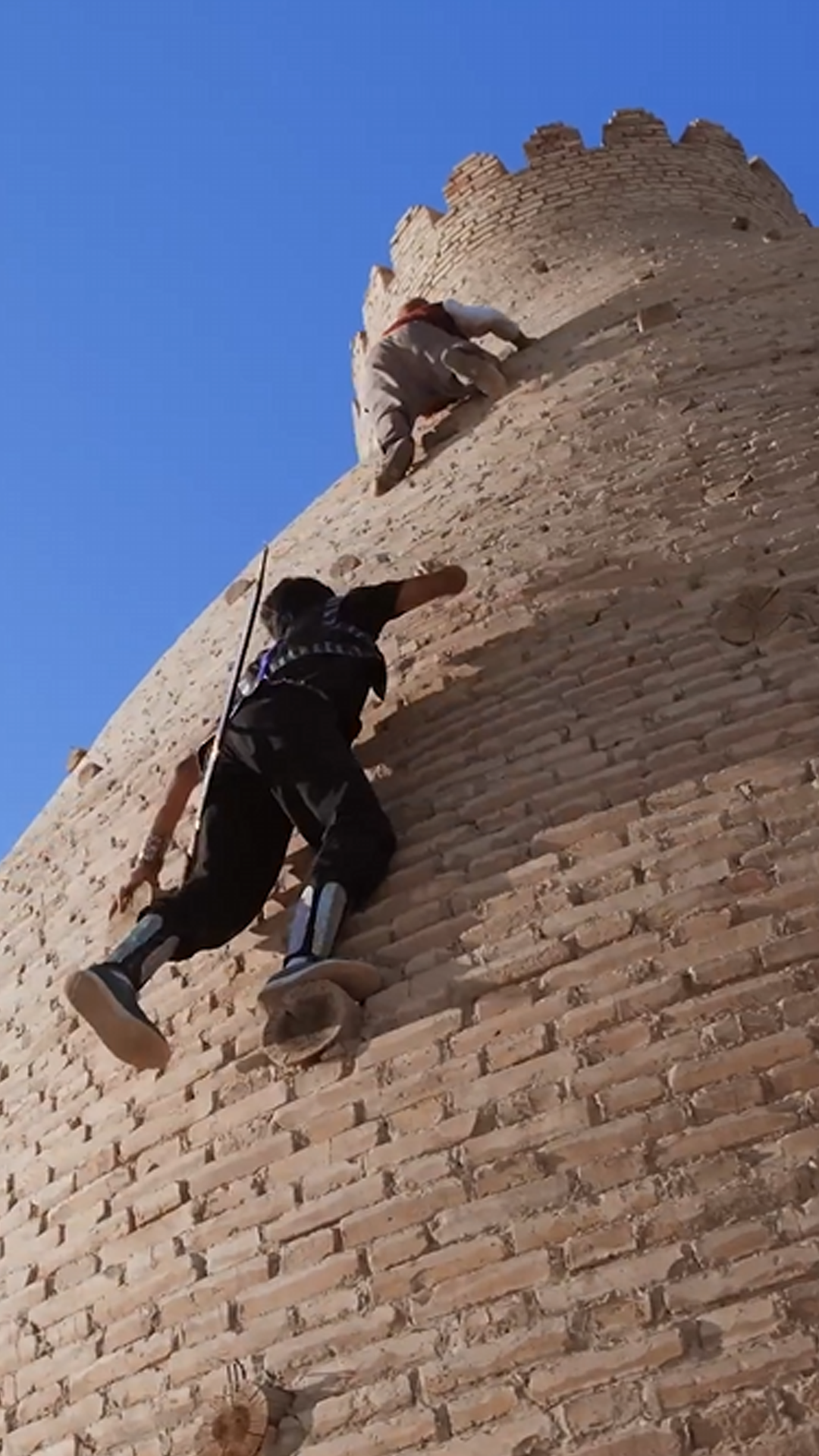 Scaling an ancient castle wall
