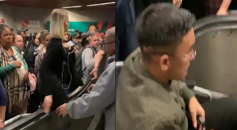 Woman climbs over escalator railing to bypass stalled wheelchair during ...