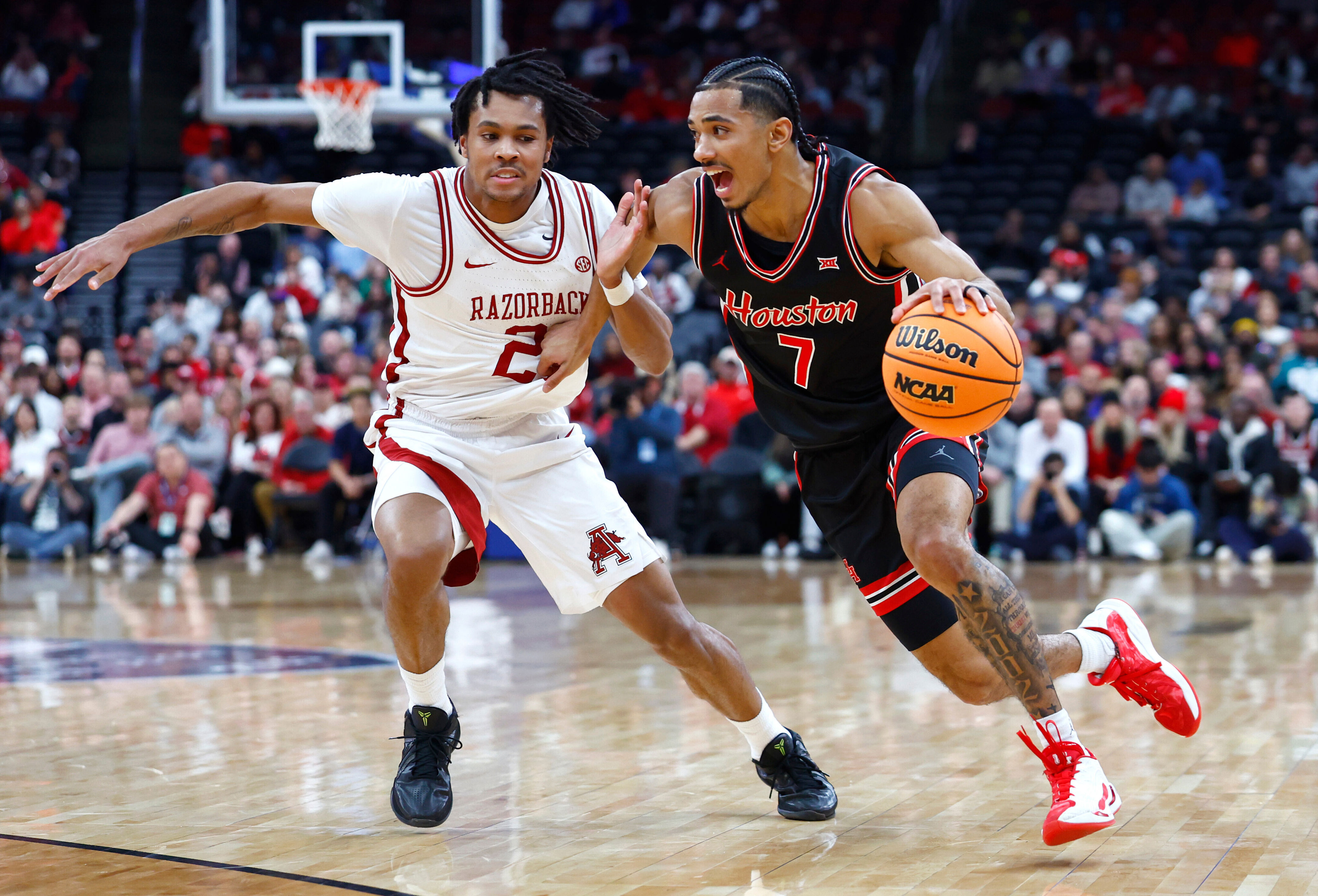 Sharp scores 22 points to lead No. 8 Houston over No. 14 Arkansas, 94-85