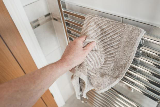 Households warned to avoid drying towels on radiators due to serious ...
