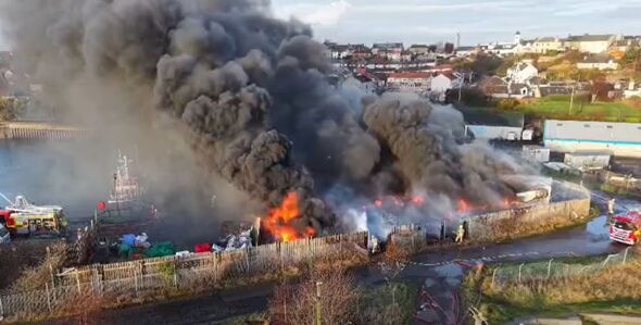 Huge fire erupts as locals told to keep windows and doors closed