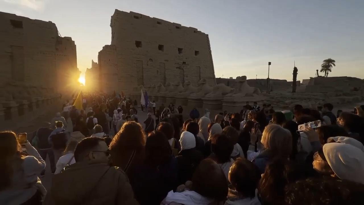 Visitors watch sun align with ancient Luxor temple on winter solstice