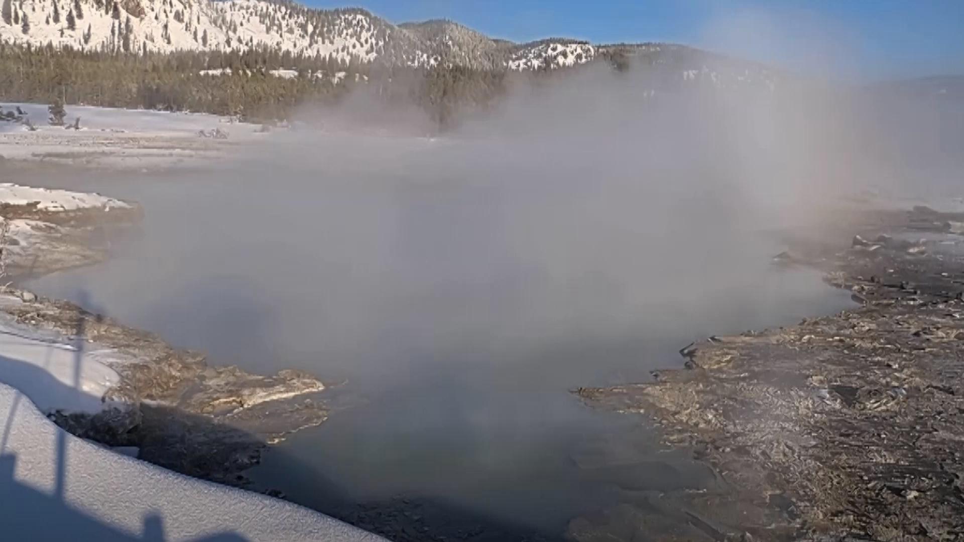 Muddy eruption at Black Diamond Pool in Yellowstone National Park